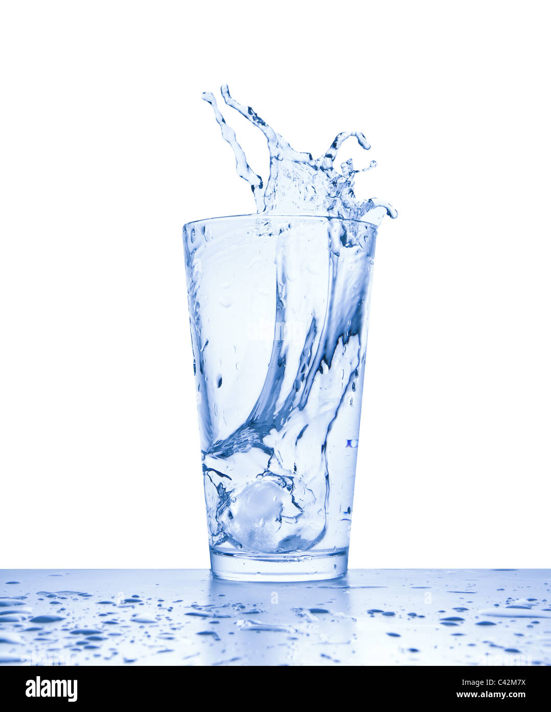 water splashing from glass isolated on white background Stock Photo - Alamy