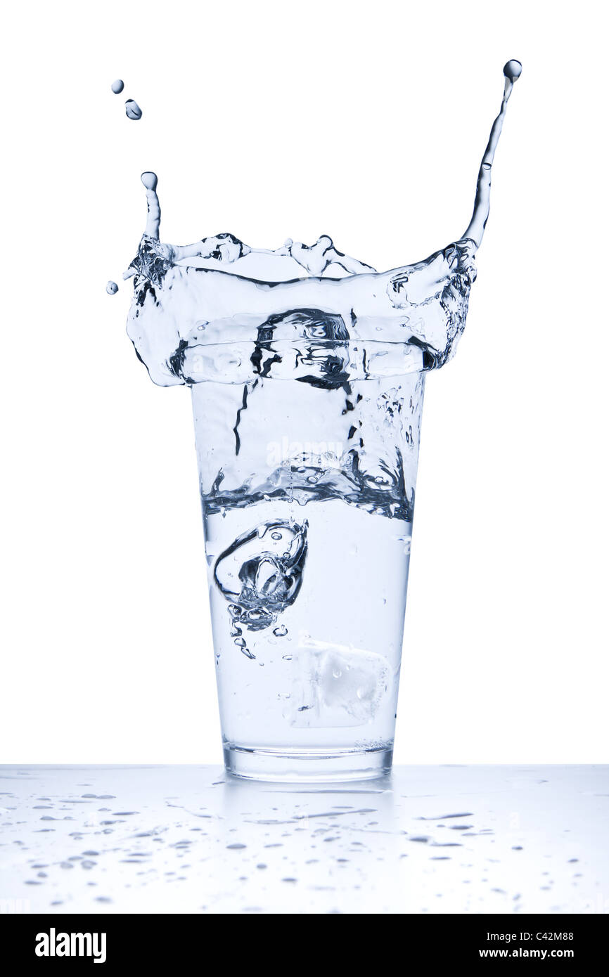 water splashing from glass isolated on white background Stock Photo - Alamy
