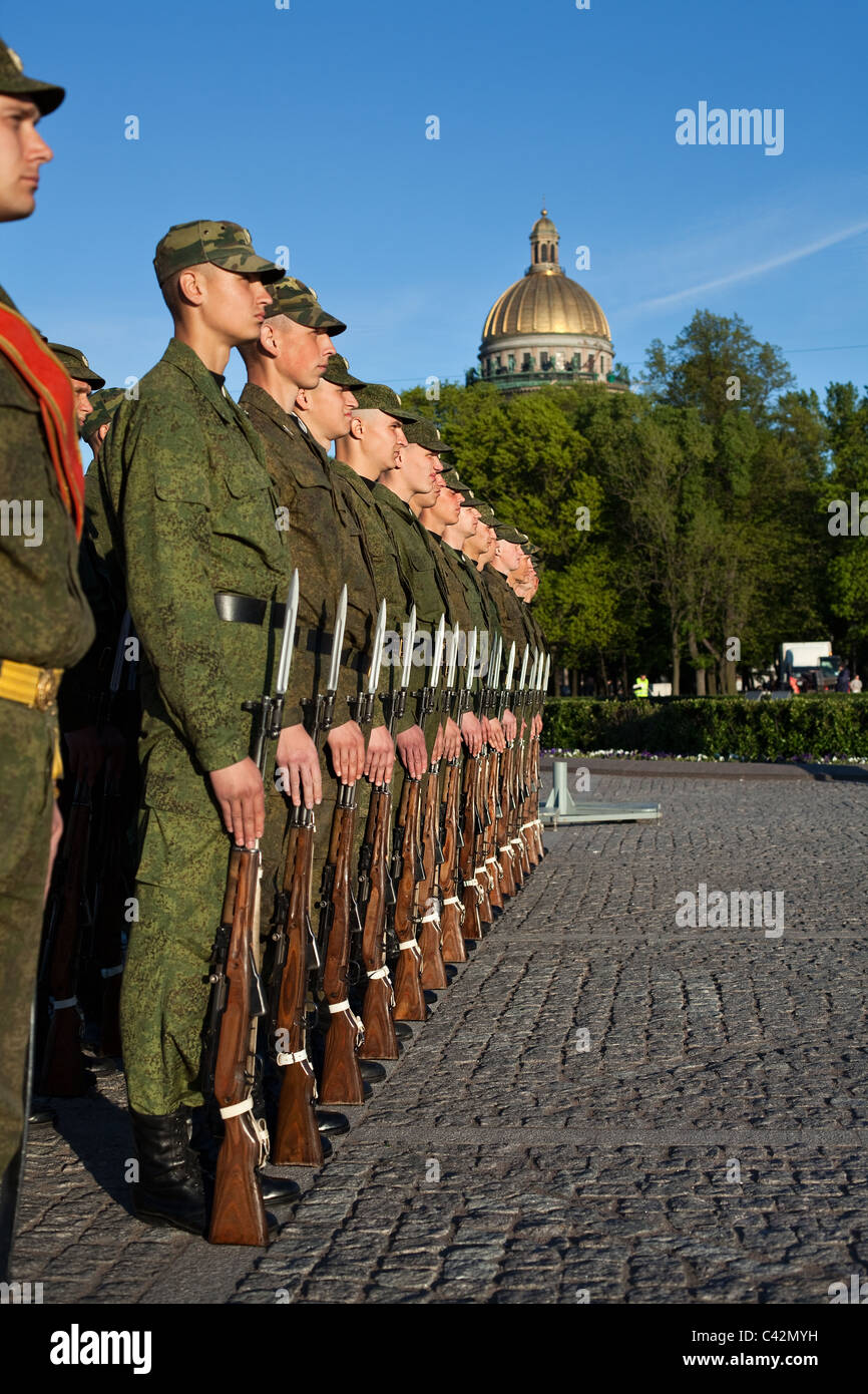 Military parade and soldiers with Russian flag and arms in line. Saint ...