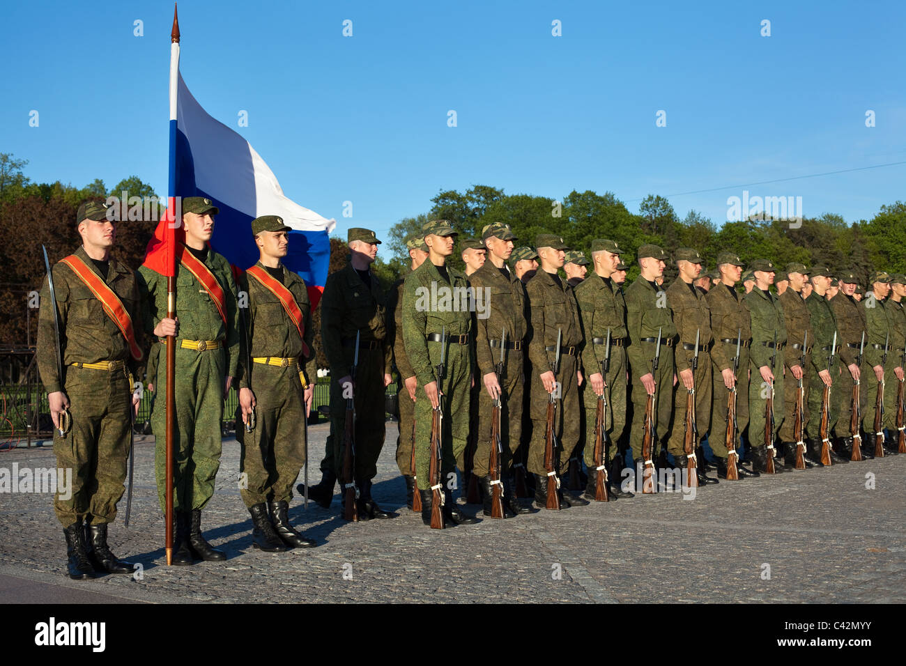 Military parade and soldiers with Russian flag and arms in line. Saint ...