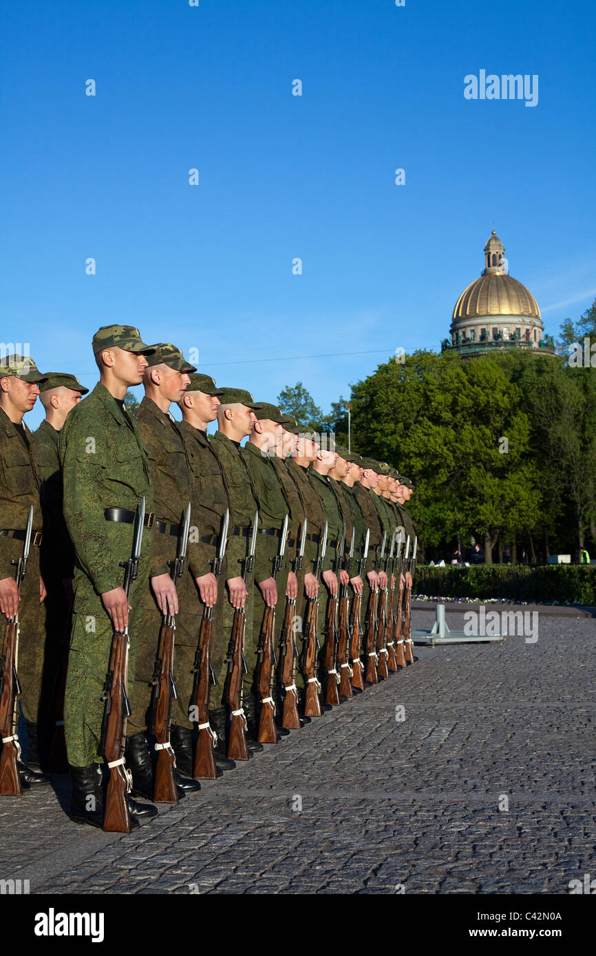 Military parade and soldiers with Russian flag and arms in line. Saint ...