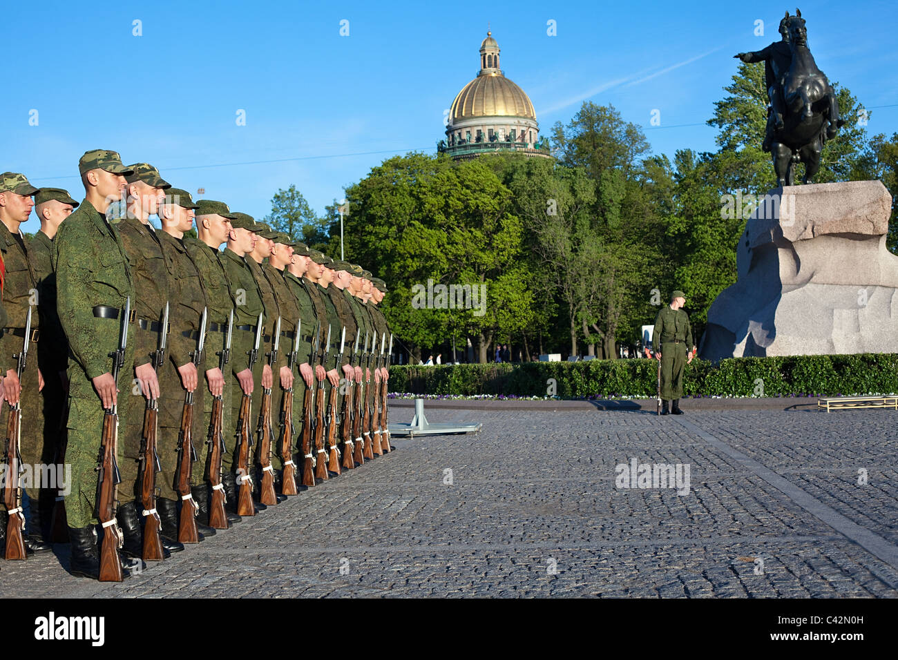 Military parade and soldiers with Russian flag and arms in line. Saint ...