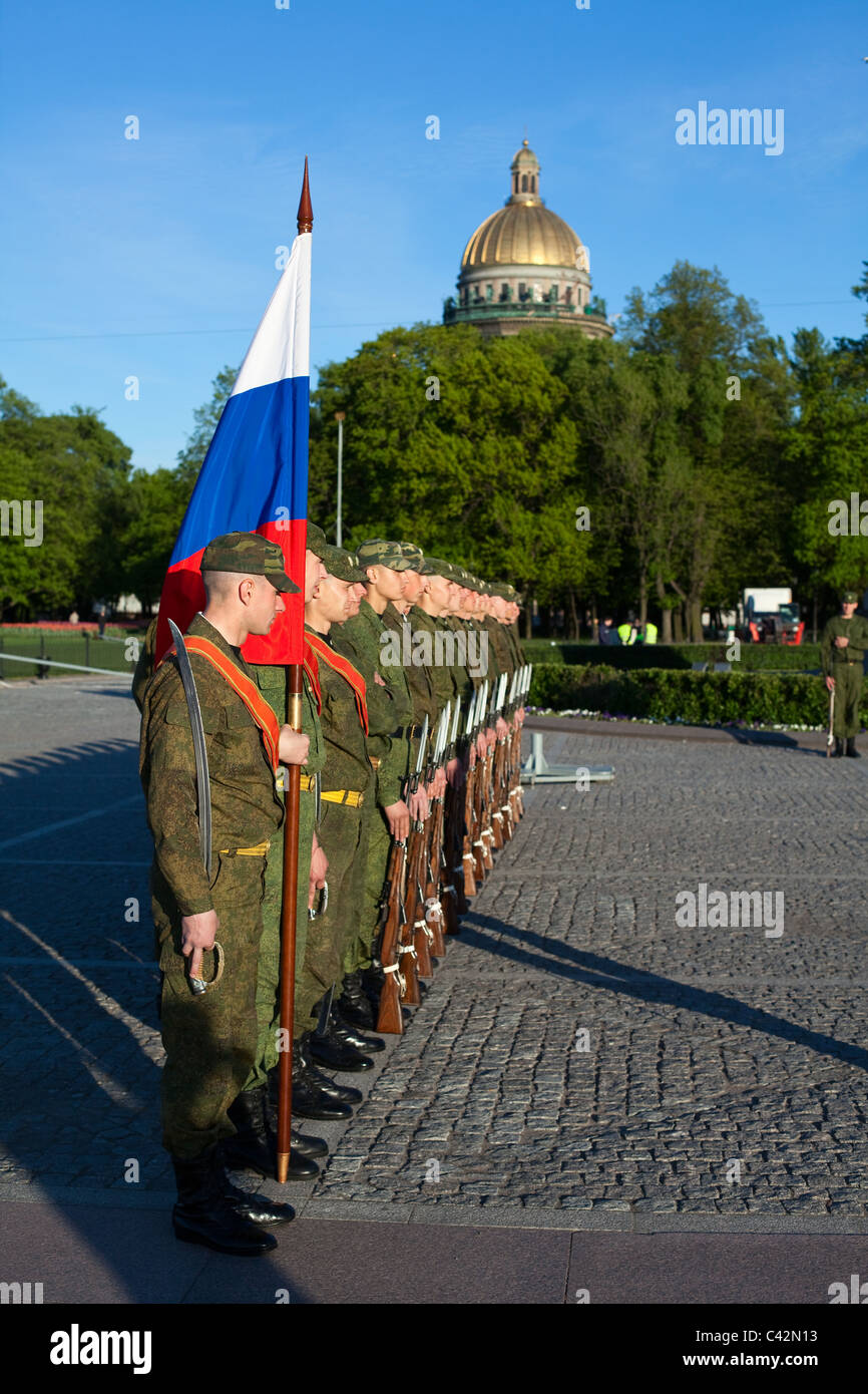 Military parade and soldiers with Russian flag and arms in line. Saint ...