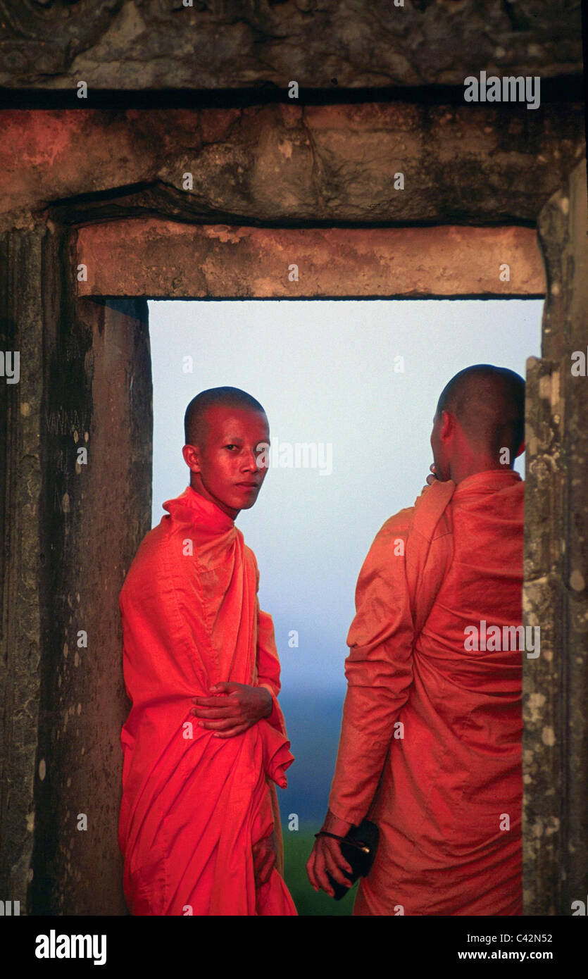 Buddhist monks at Bakheng temple. Angkor Wat complex, Cambodia Stock ...