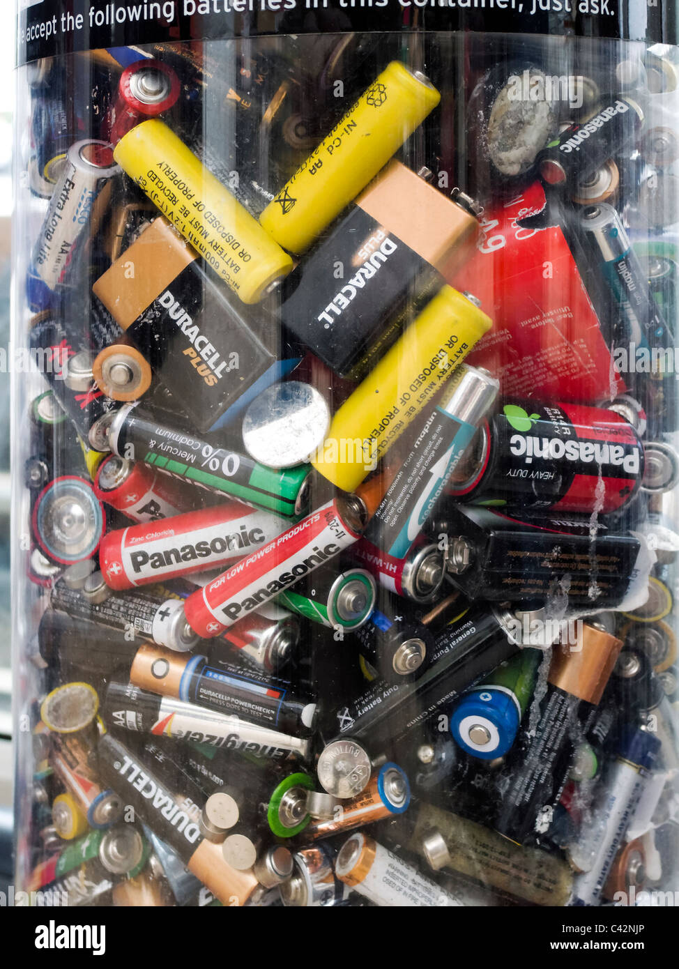 Battery recycling container in public shopping area Stock Photo - Alamy