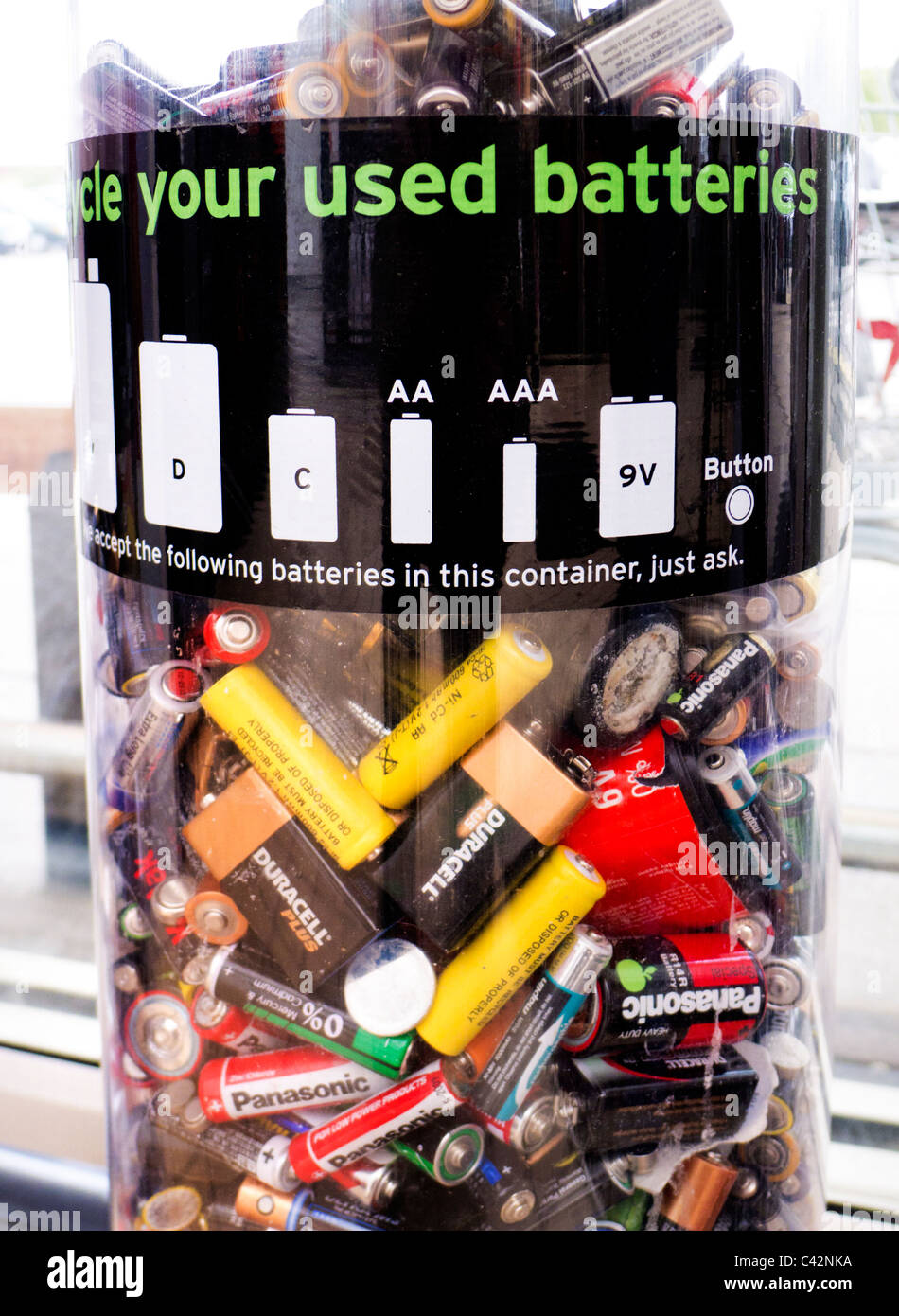 Battery recycling container in public shopping area Stock Photo - Alamy