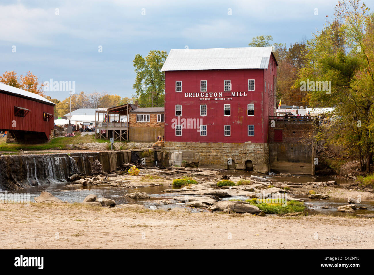 Bridgeton Covered Bridge spans a waterfall next to the original ...