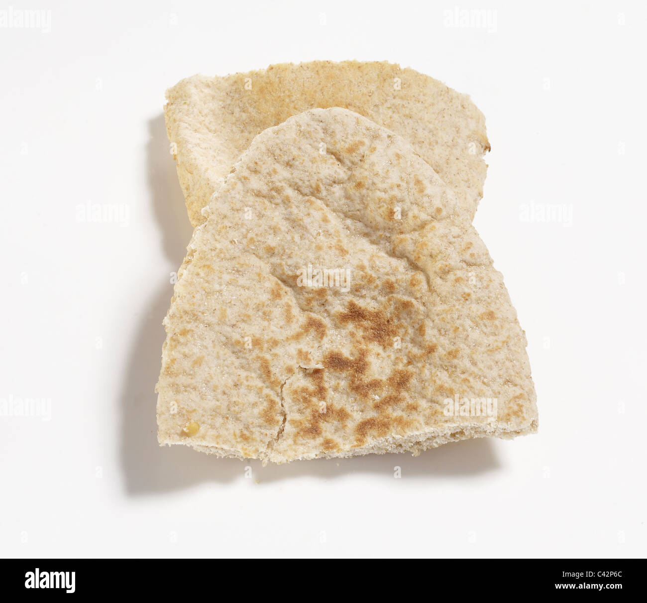 Pitta bread cut in half Stock Photo - Alamy