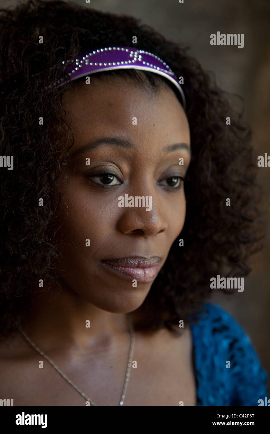 Lovely black woman with pleasing friendly smile Stock Photo - Alamy
