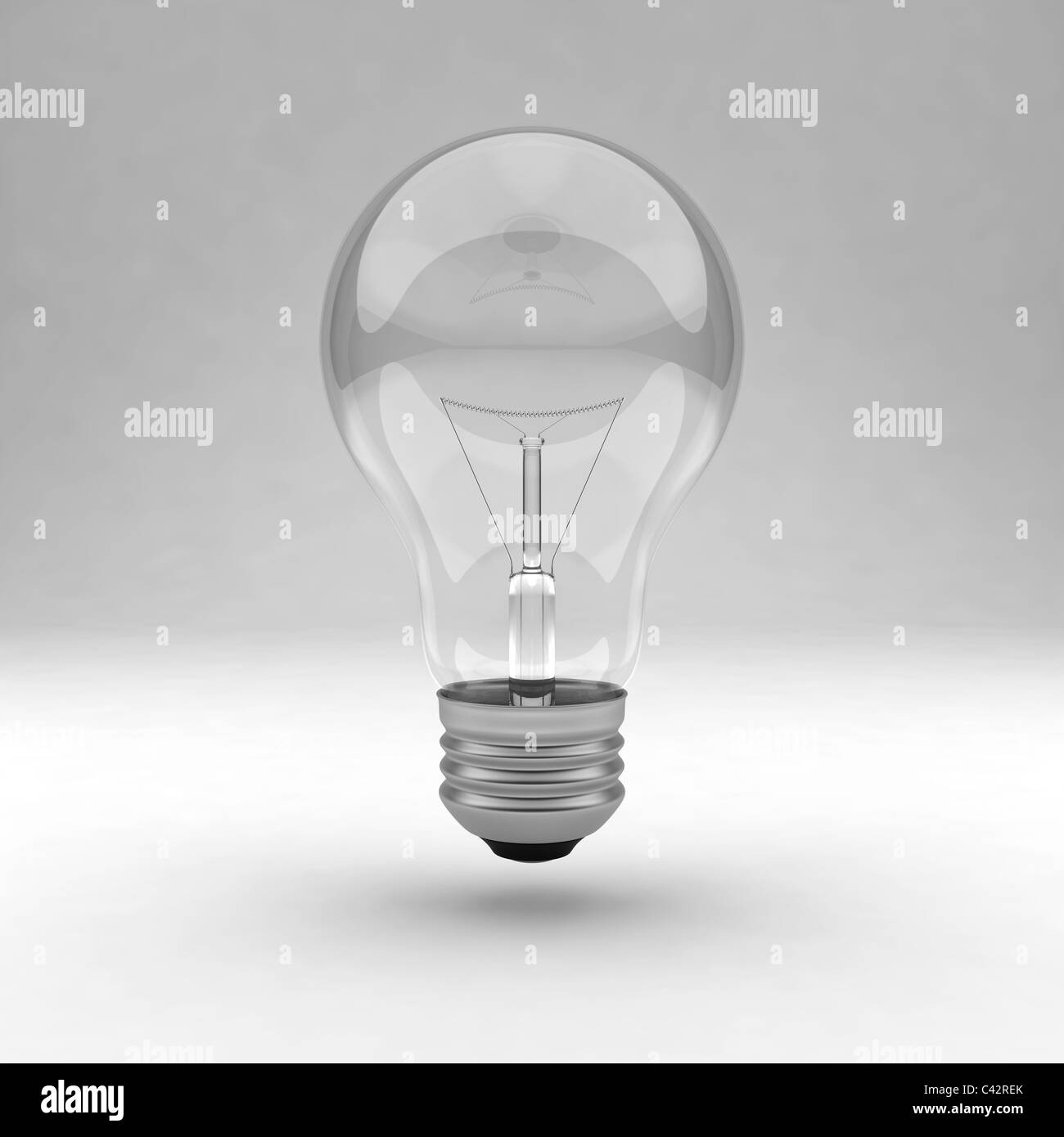 Lightbulb single clear isolated against background Stock Photo - Alamy