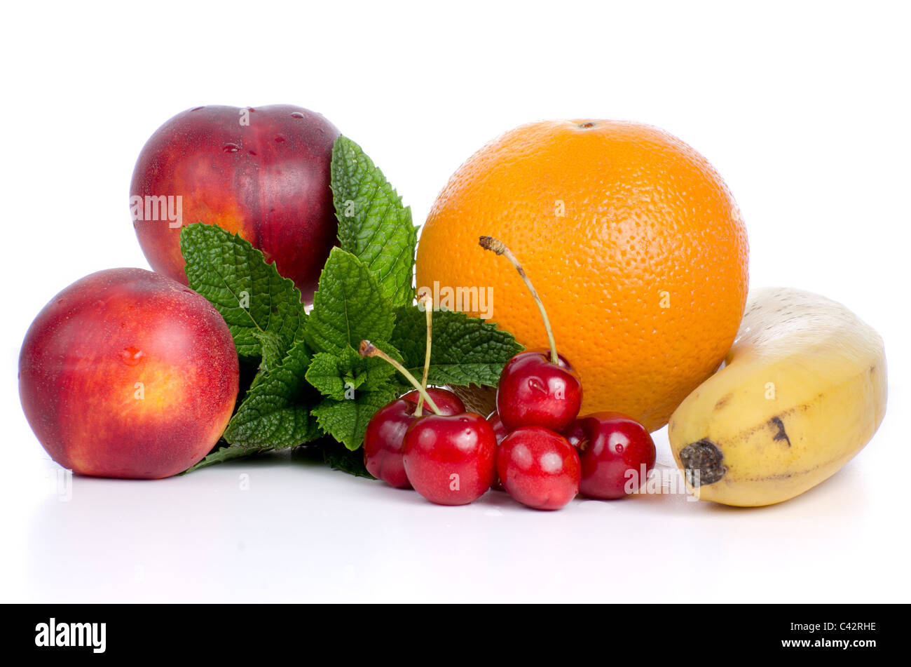 Fresh fruits on a white background Stock Photo - Alamy