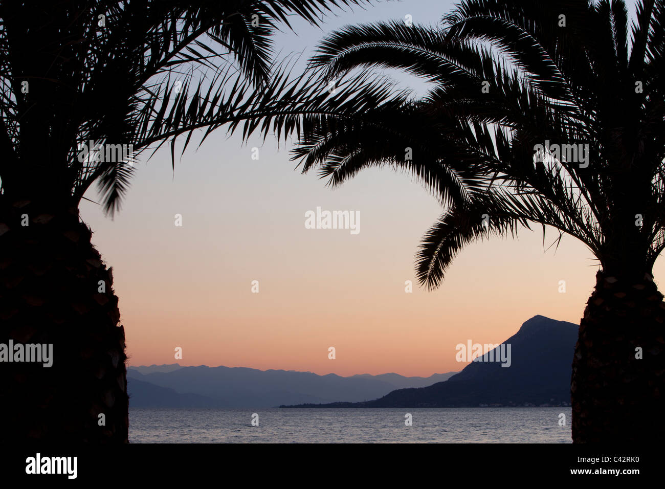 Sunset over the Bay of Edipsos in Edipsos, Greece Stock Photo - Alamy