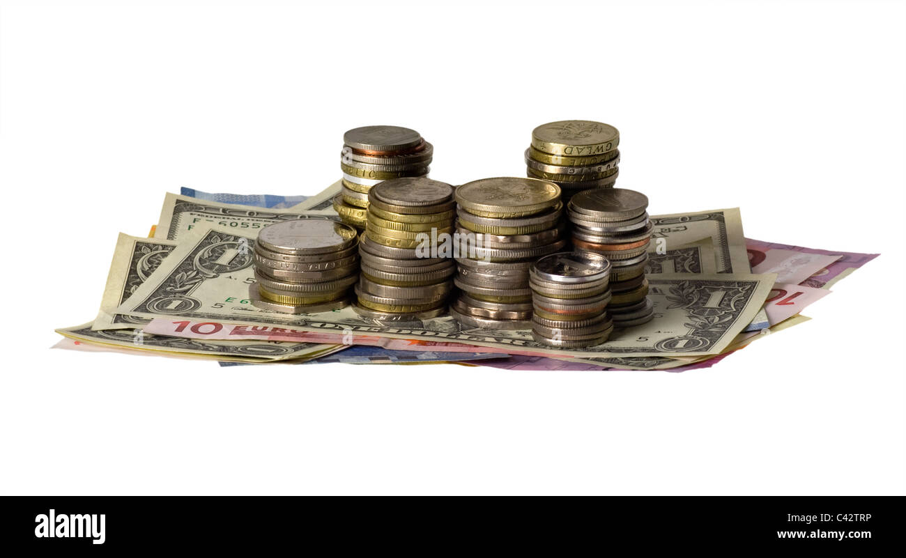 Pile of notes and coins of various countries isolated on white ...