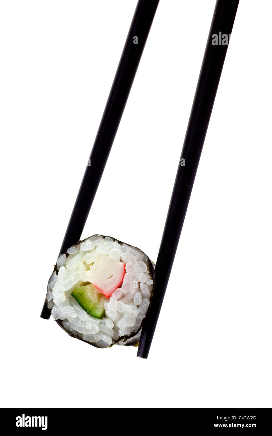 Chopsticks holding maki sushi isolated on white background Stock Photo - Alamy
