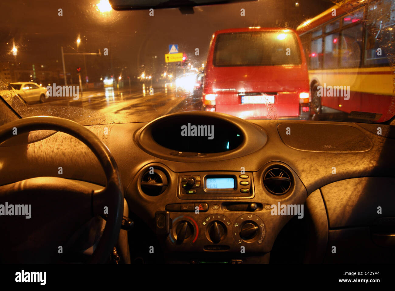 Driving at night through the streets Stock Photo - Alamy