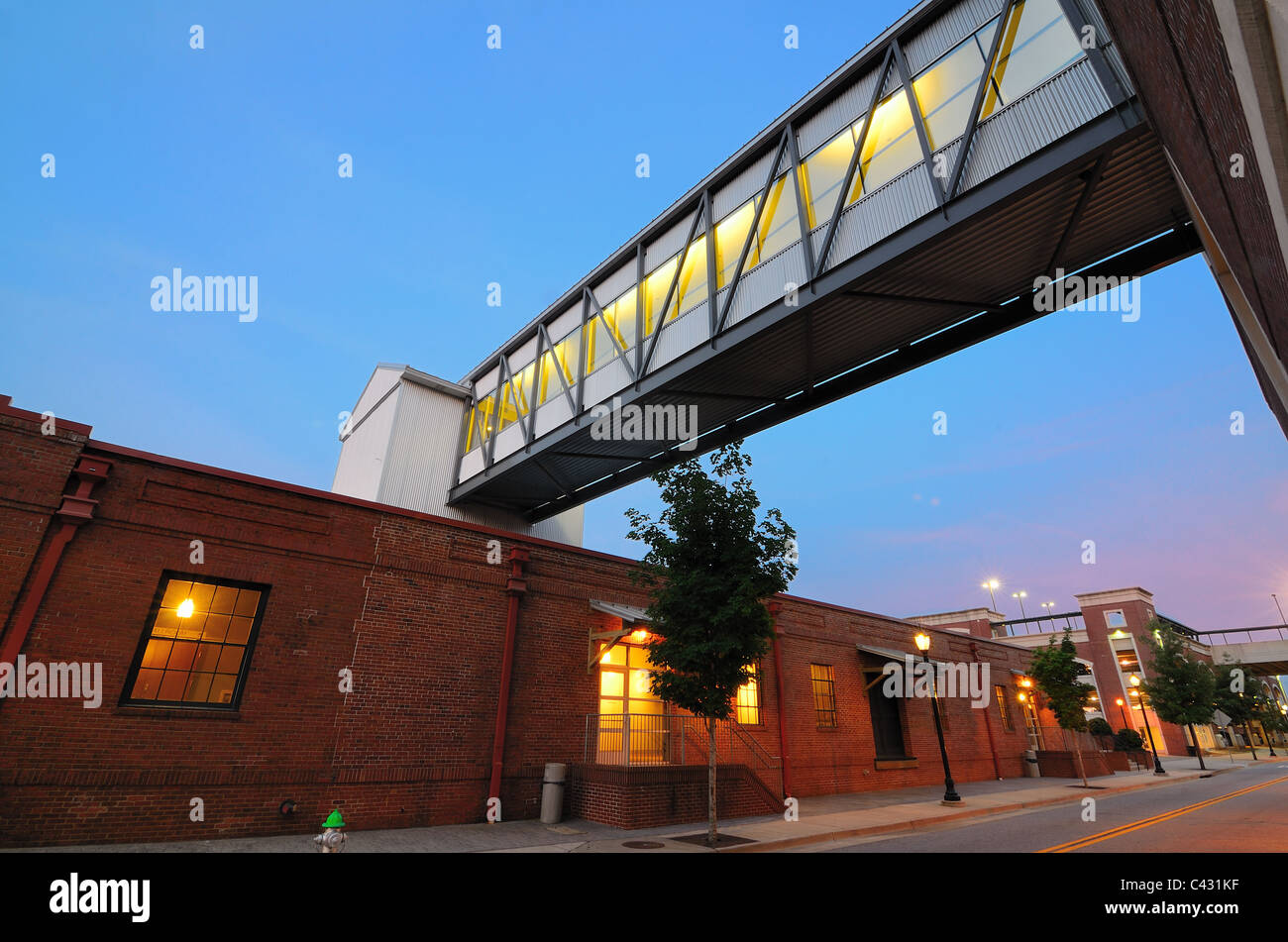 pedestrian footbridge over city buildings Stock Photo - Alamy
