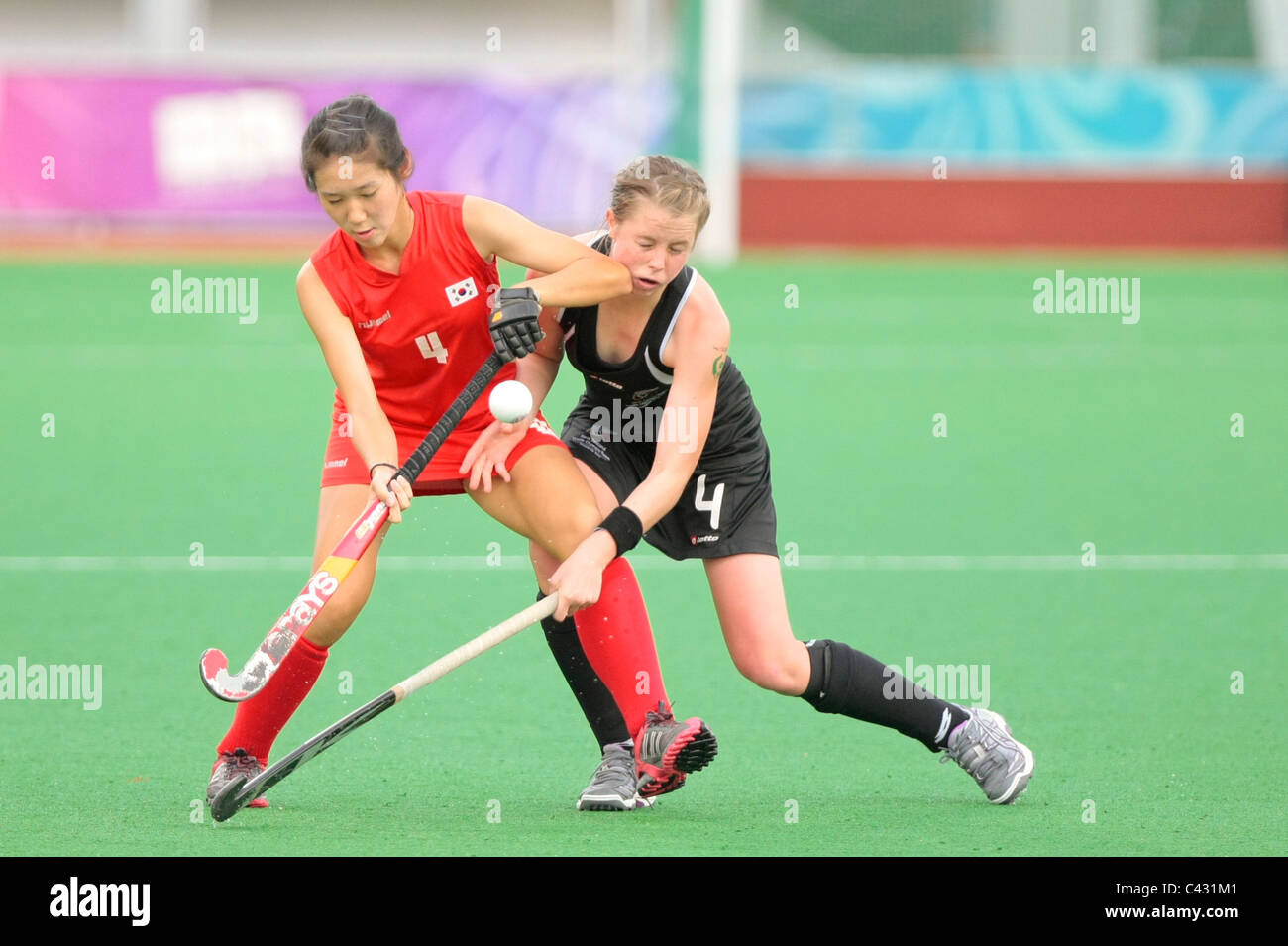 South Korea's Choi Yong Seon(left) out-muscles New Zealand's Jessica ...