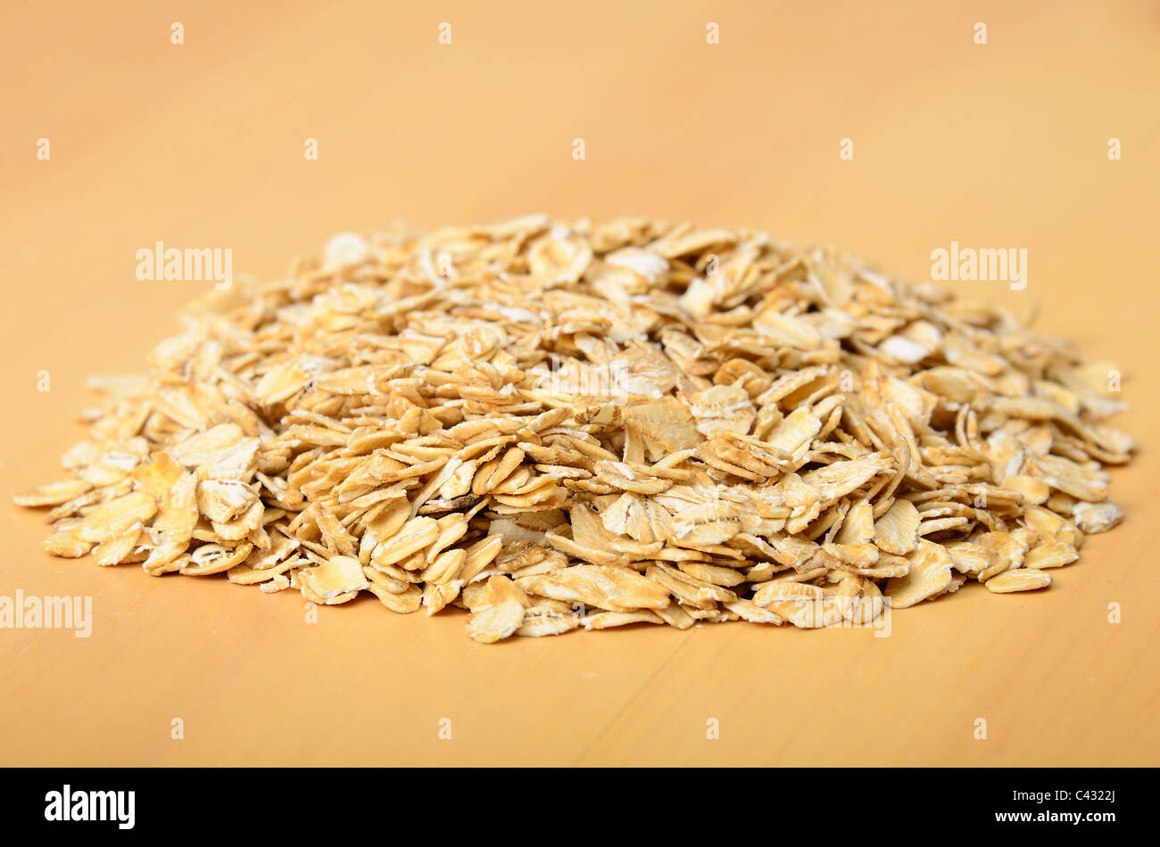 Oat meal poured on a table Stock Photo - Alamy