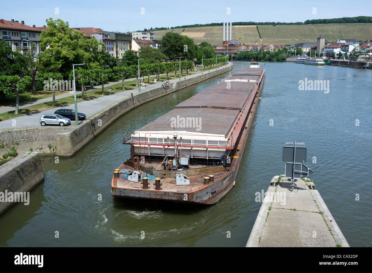 A large barge on the River Maine, Germany, entering the lock at ...
