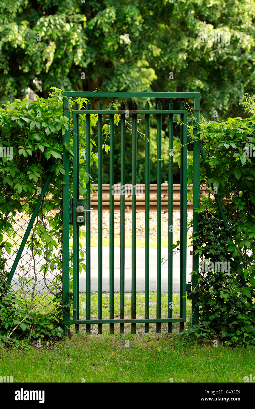 Green garden gate Stock Photo - Alamy