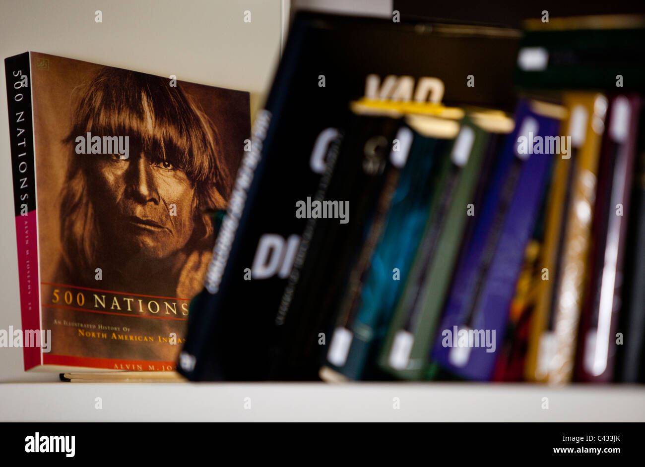 group of books in a shelf Stock Photo - Alamy