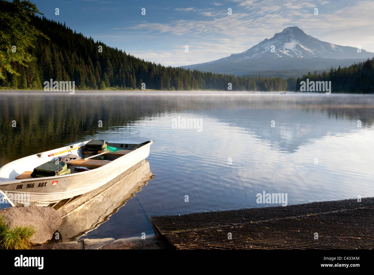 Fishing boat on Trillium Lake with Mount Hood, Oregon USA Stock Photo ...