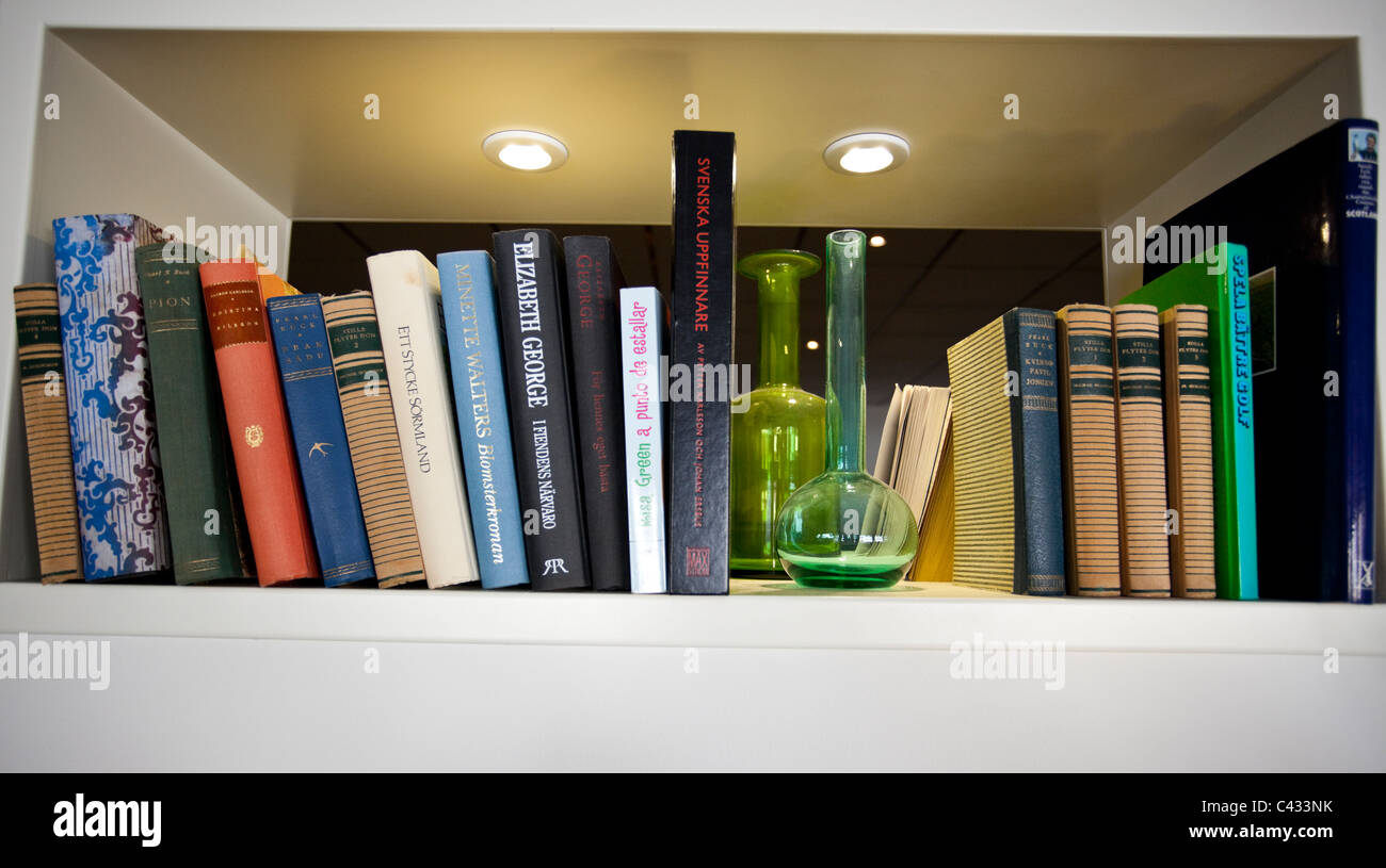 Group of books in a shelf Stock Photo - Alamy