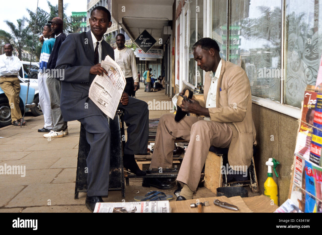 Shoe Shine Man High Resolution Stock Photography and Images - Alamy
