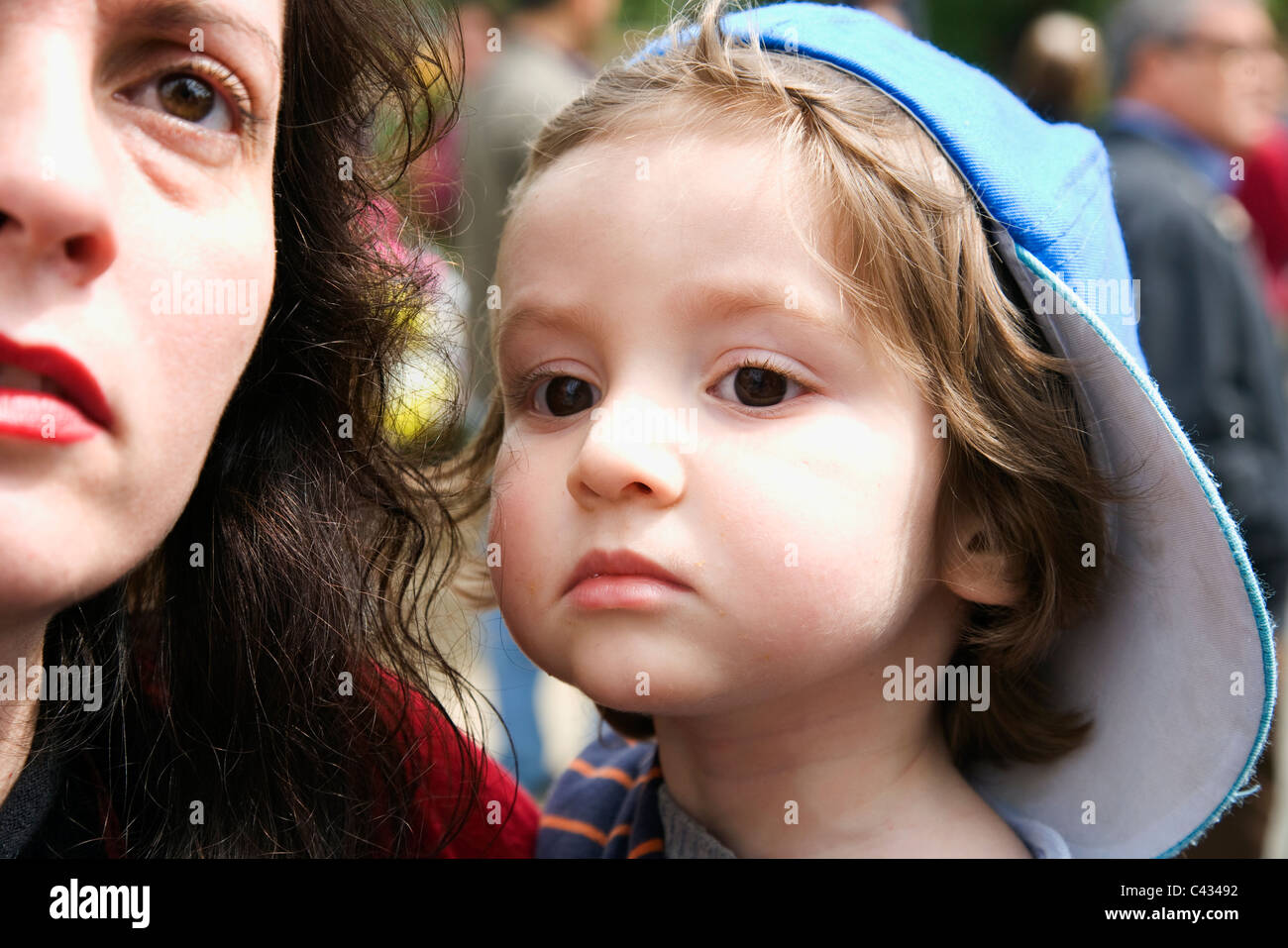 Spanish mother holding her young son Stock Photo - Alamy