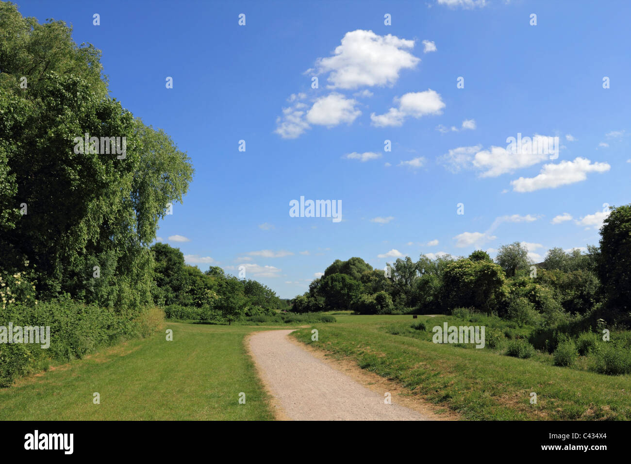 Track through parkland at Hogsmill Open Space Ewell Surrey England UK ...
