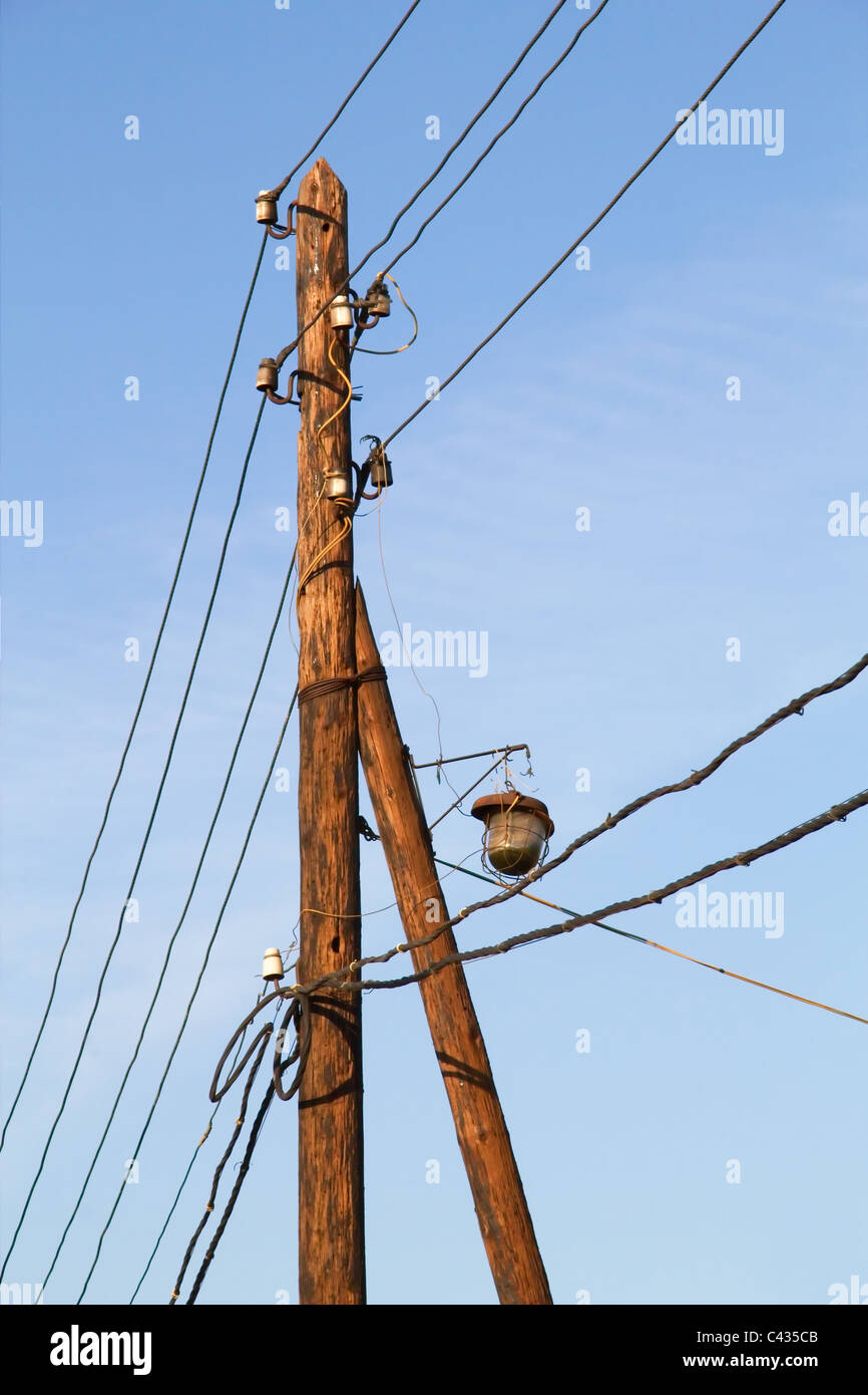 Old lamp post on a background of blue sky Stock Photo - Alamy