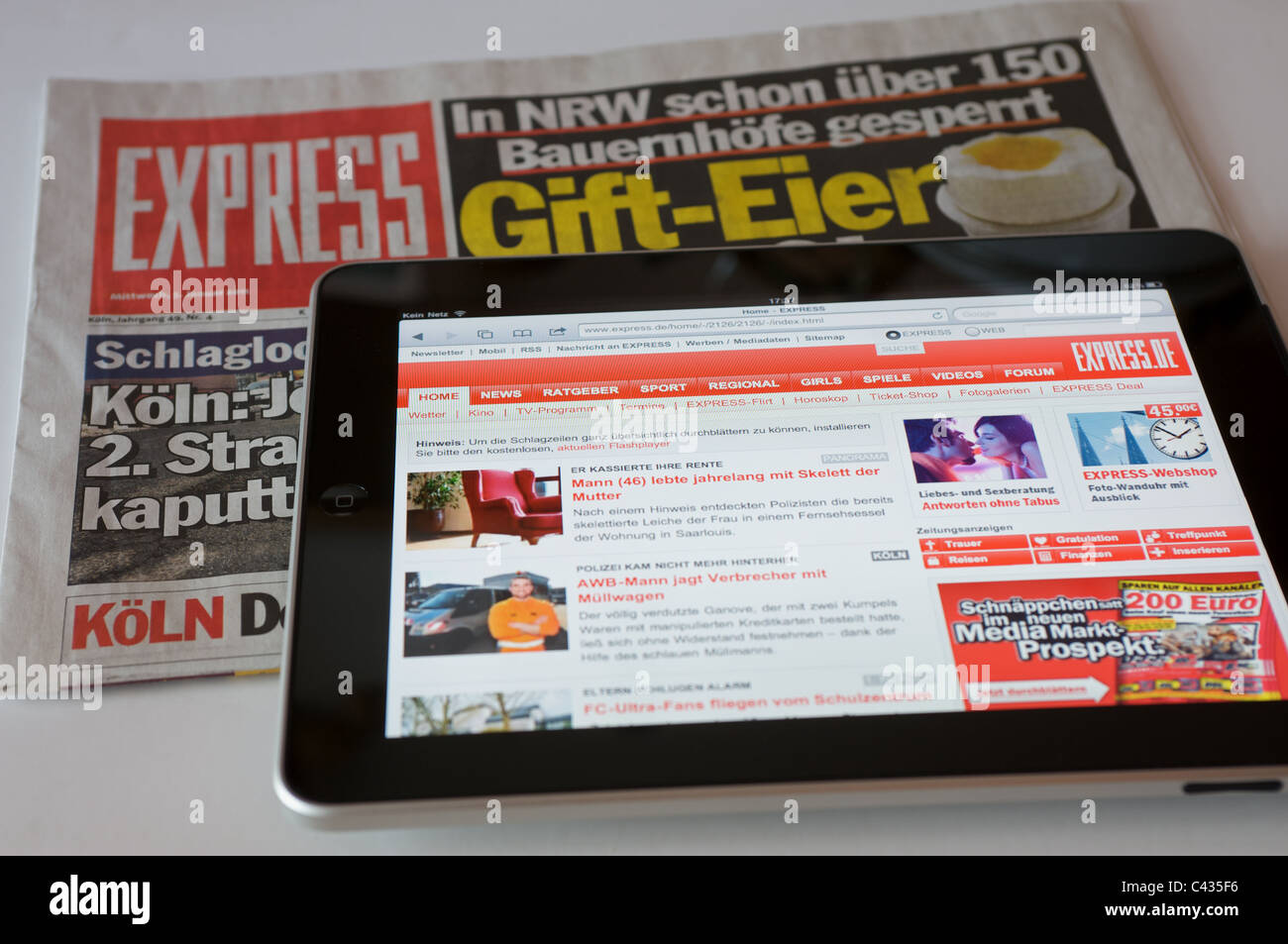 Tablet computer display the Express German newspaper Stock Photo - Alamy
