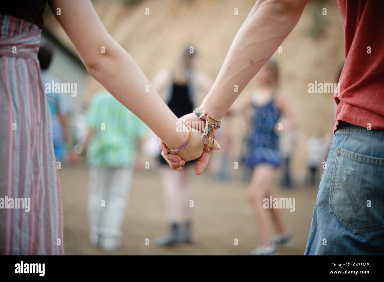 Kids holding hands Stock Photo - Alamy