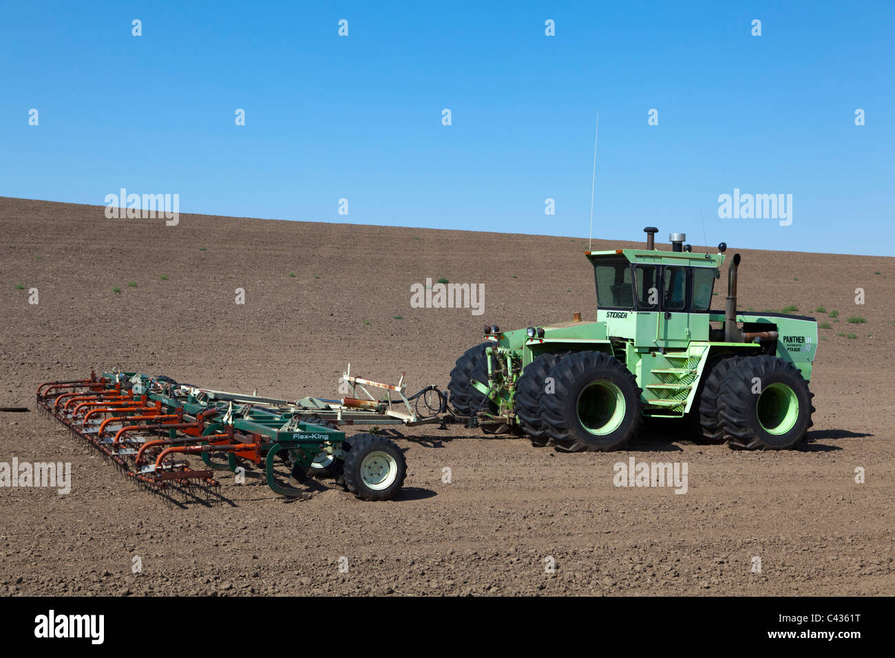 Bare soil and Steiger Panther tractor being prepared for a crop Palouse ...
