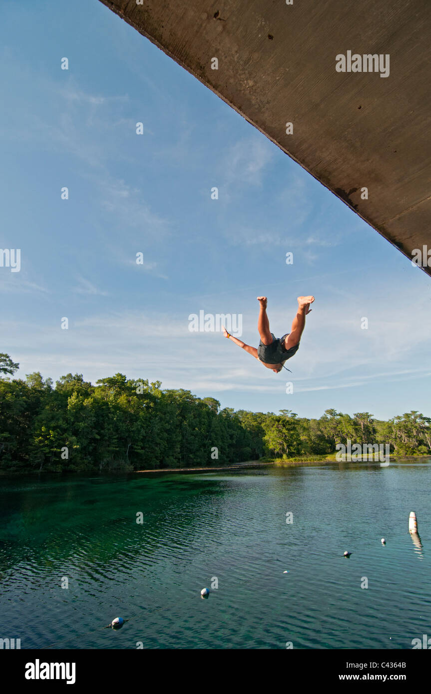 Man leaping from the high tower into the main spring at Edward Ball ...