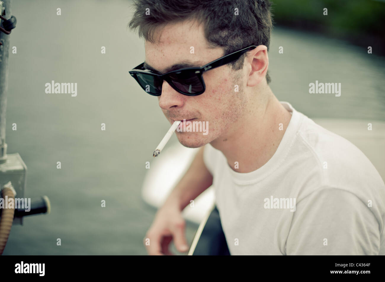 Boy Smoking Cigarette High Resolution Stock Photography and Images - Alamy