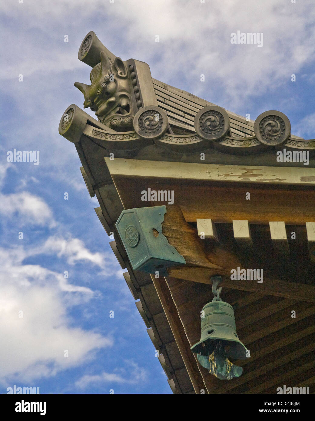 Guardian spirit on the corner of a traditional Japanese temple Stock ...