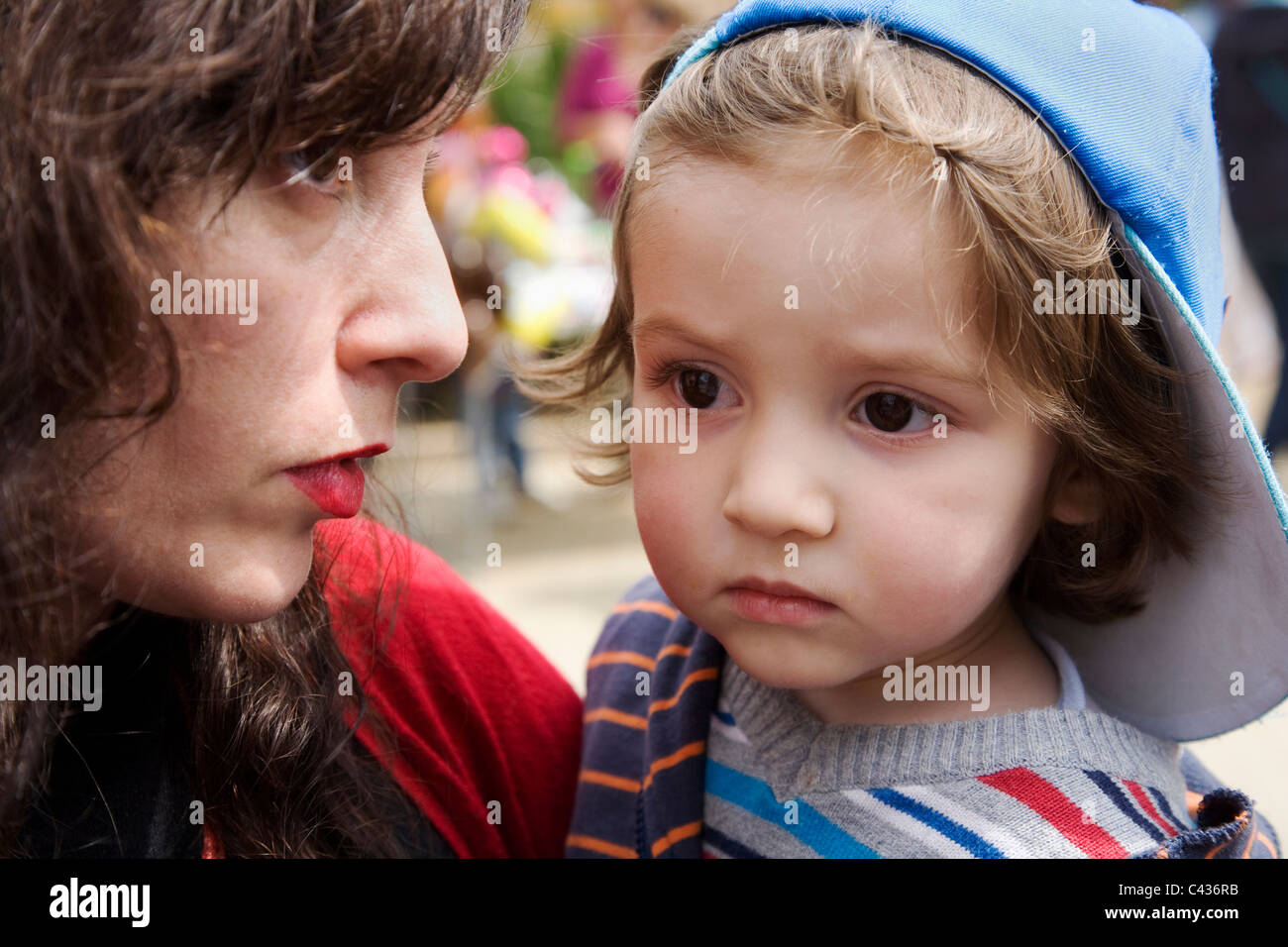 Spanish mother holding her young son Stock Photo - Alamy