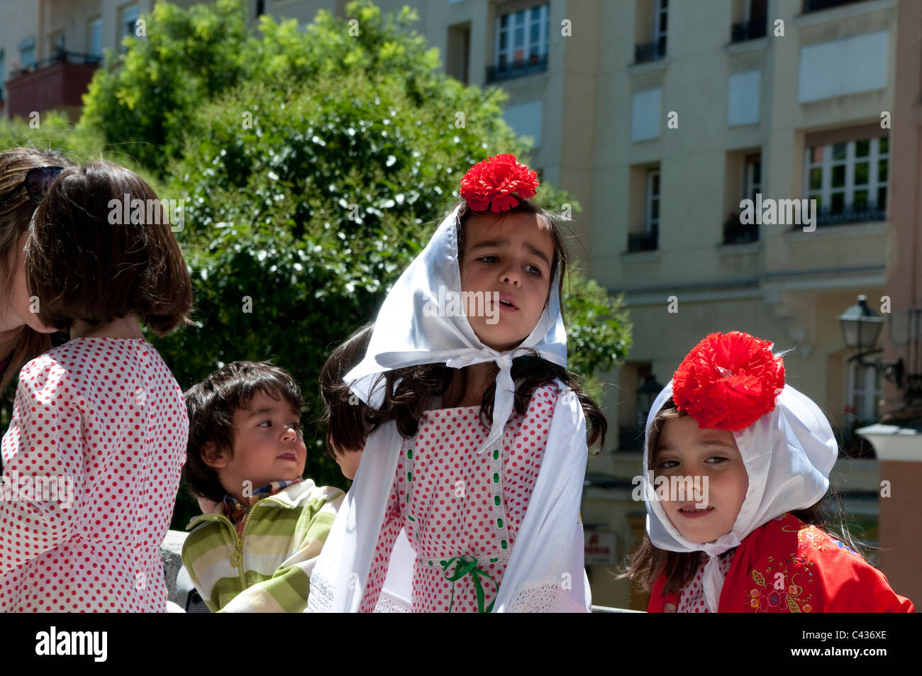 Girls dressed in chulapa - traditional costume, Plaza de la Corrala in ...