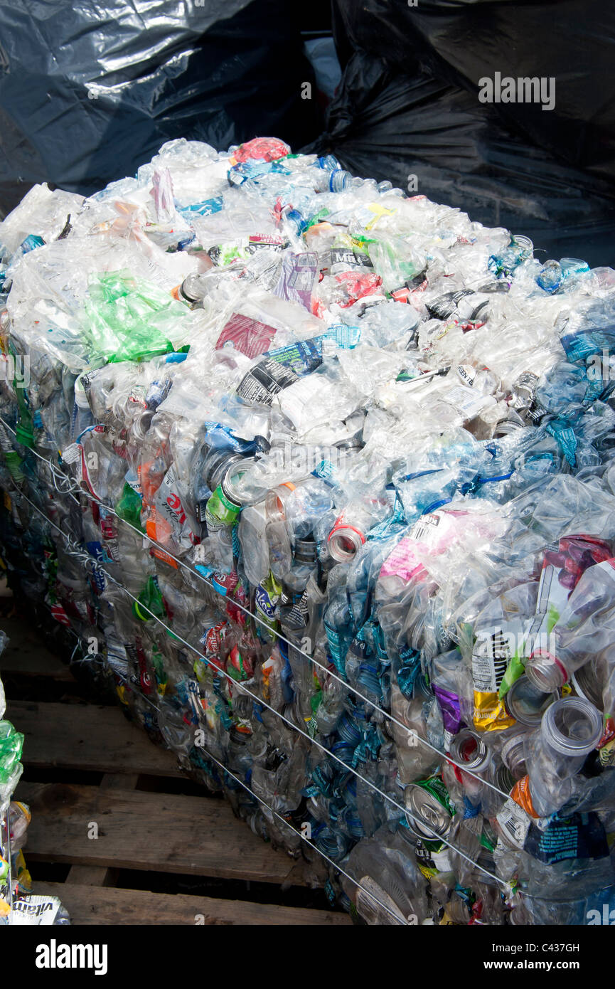 Plastic bottles and other containers have been collected and packaged ...