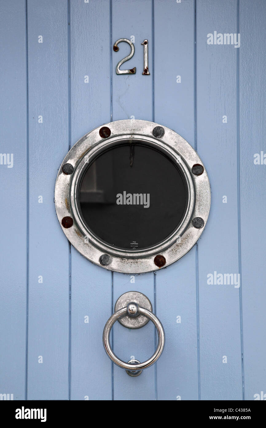 21 twenty one number blue door Stock Photo - Alamy