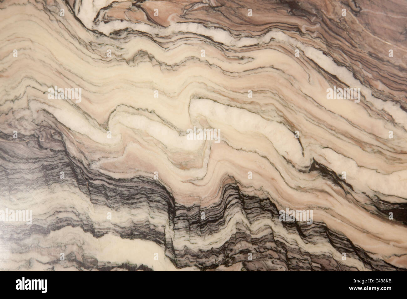 Cream colored Abstraction in Stone Stock Photo - Alamy