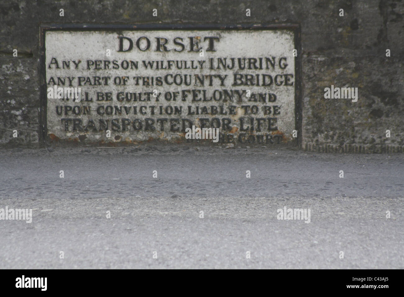 Sign on Wareham North Bridge warning that any damage to the bridge will ...