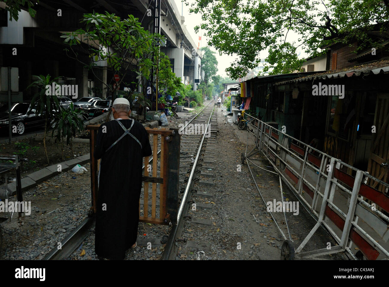 Life along the railroad tracks in a poor section in the heart of ...