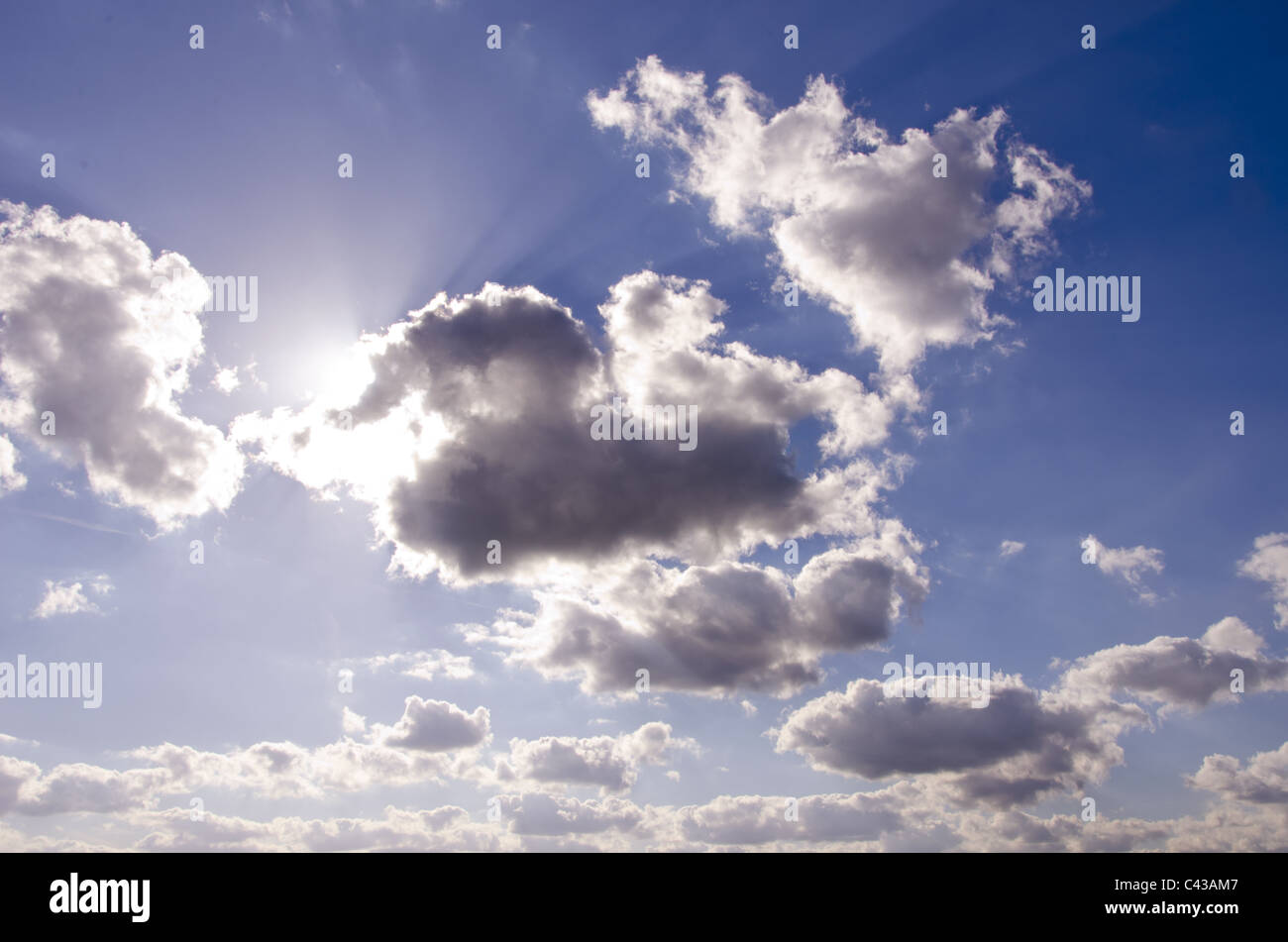 Wonderful view of sky with some clouds. Sun rays trying penetrate ...