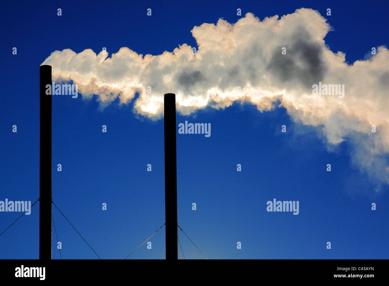 Steam venting from chimneys Stock Photo - Alamy