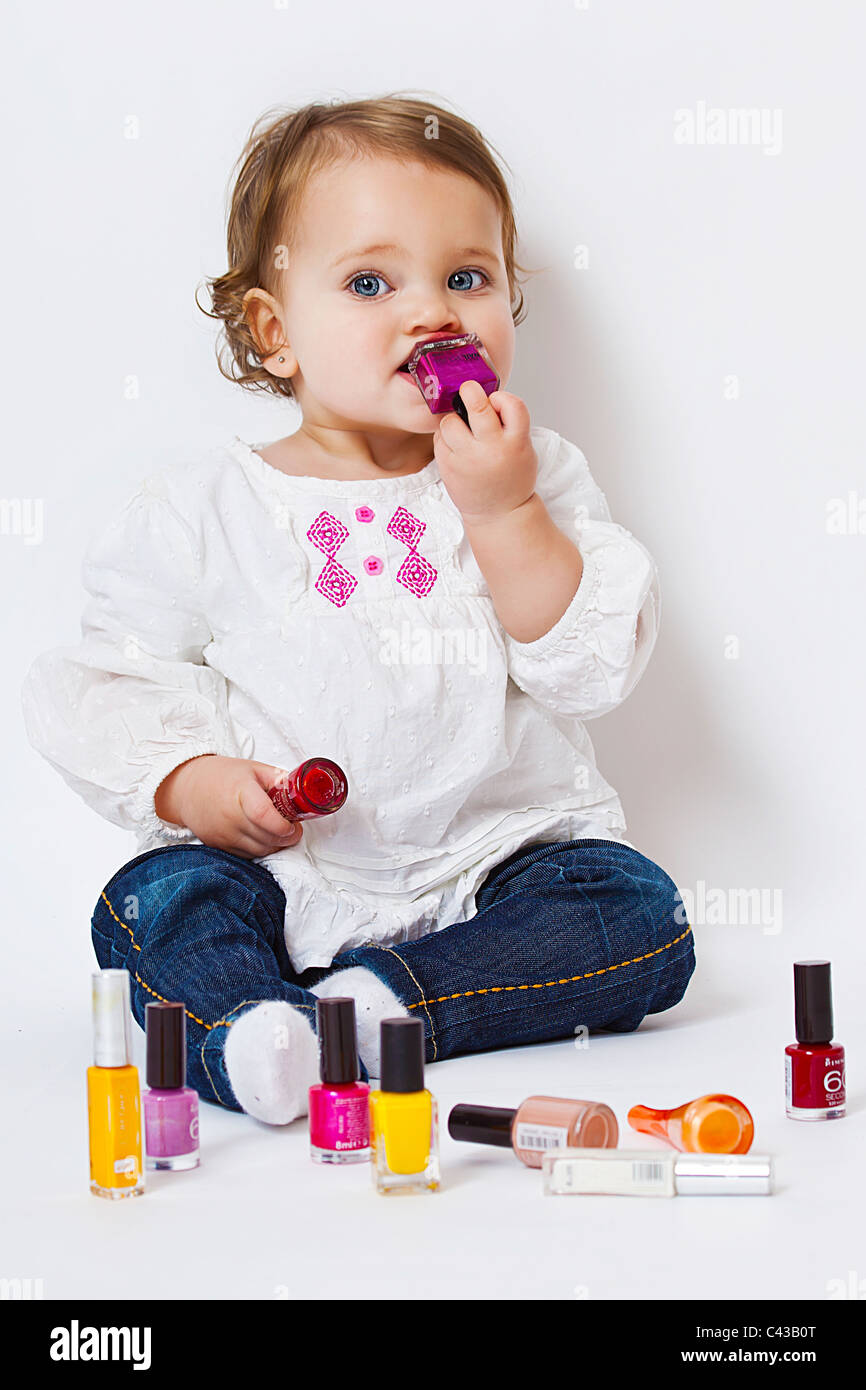 little girl with colorful nail polish Stock Photo - Alamy
