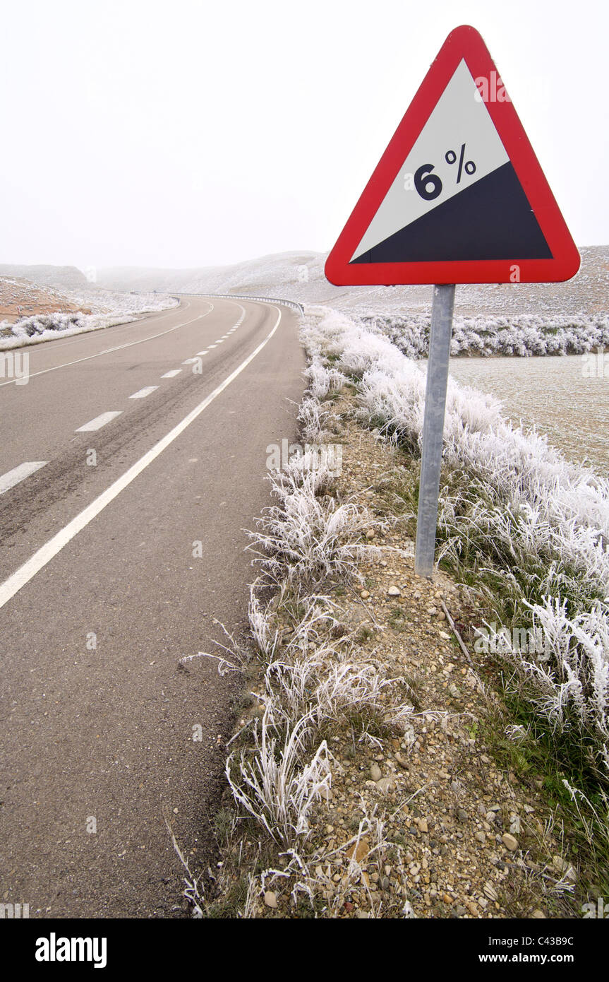 descent traffic sign in a snowy landscape Stock Photo - Alamy