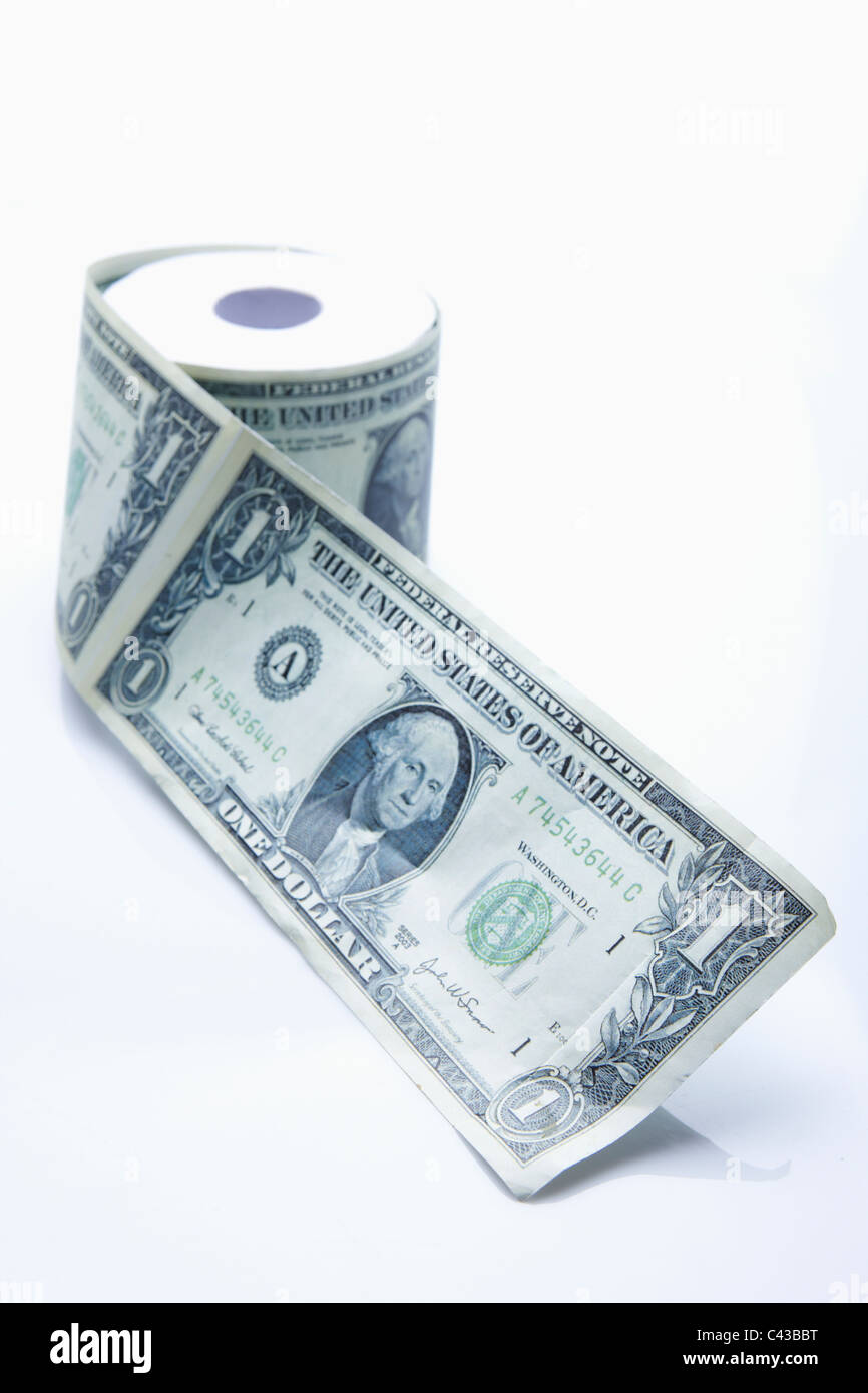 bills rolled as waste paper Stock Photo - Alamy