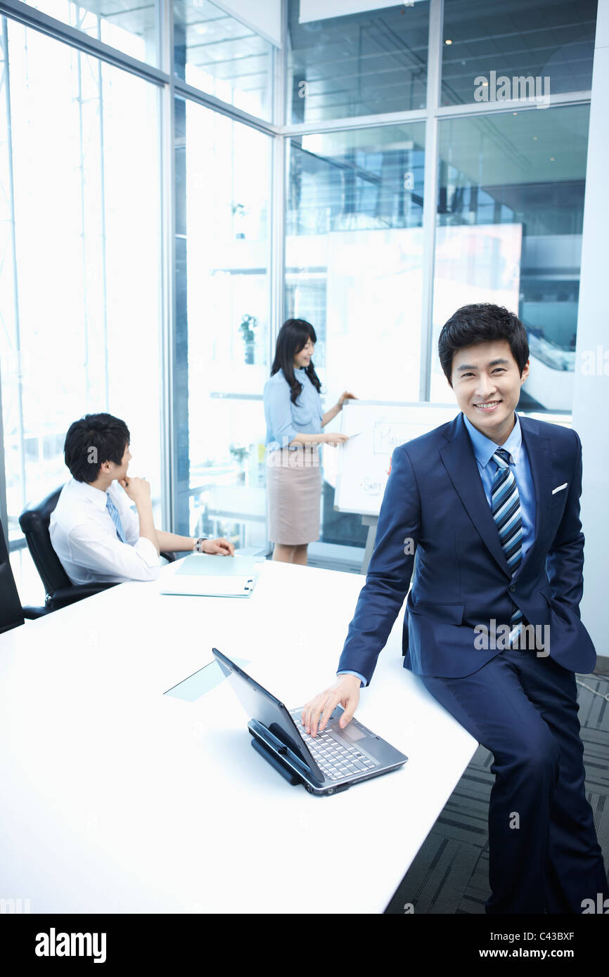 woman doing presentation to people in meeting room Stock Photo - Alamy